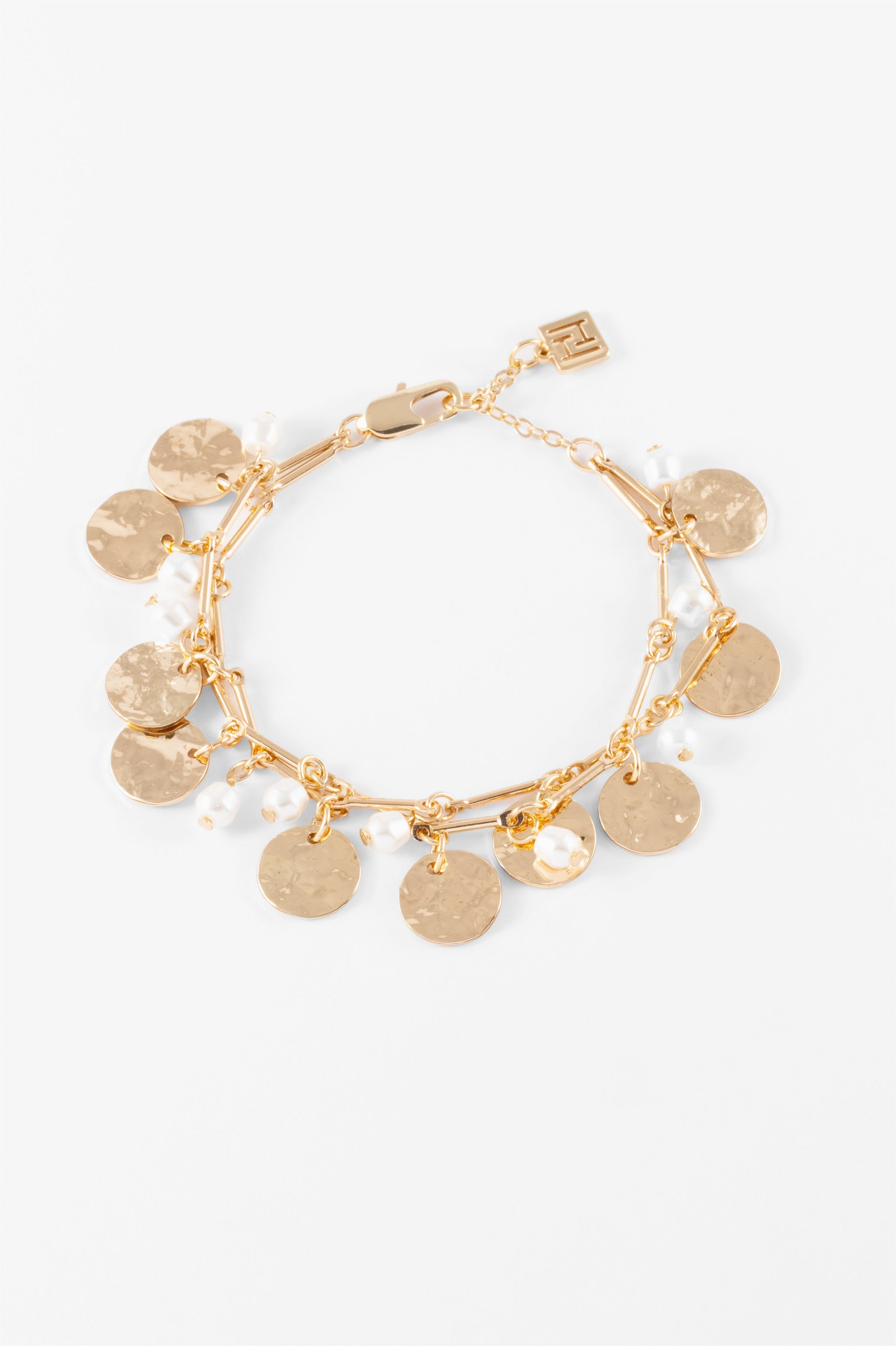 GOLD MOLTEN DISC MULTI STRAND WRISTWEAR
